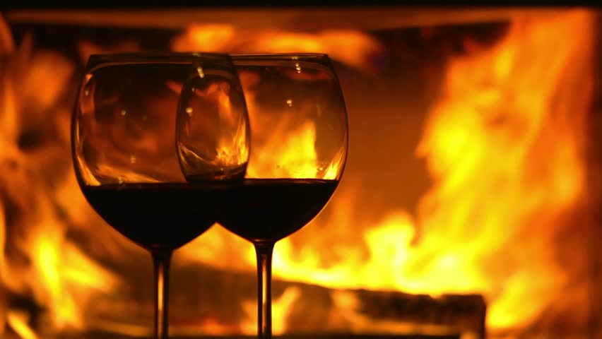 Cinemagraph Glass Of Red Wine Against Fire Burning In A Fireplace Stock Footage Video 15001573