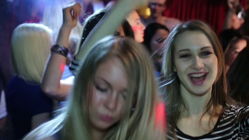 Ten Sexy Men And Women Dance And Have Fun At Modern Night Club Stock
