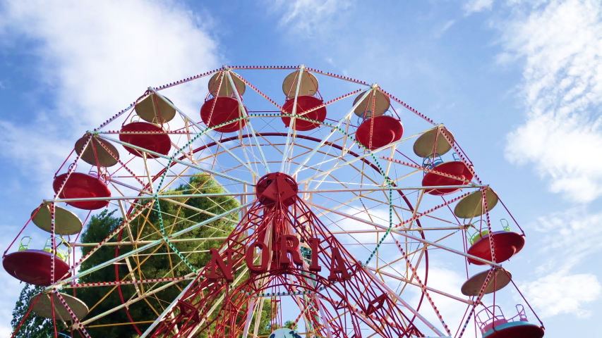 Ferris Wheel Spinning in Amusement Stock Footage Video (100% Royalty ...