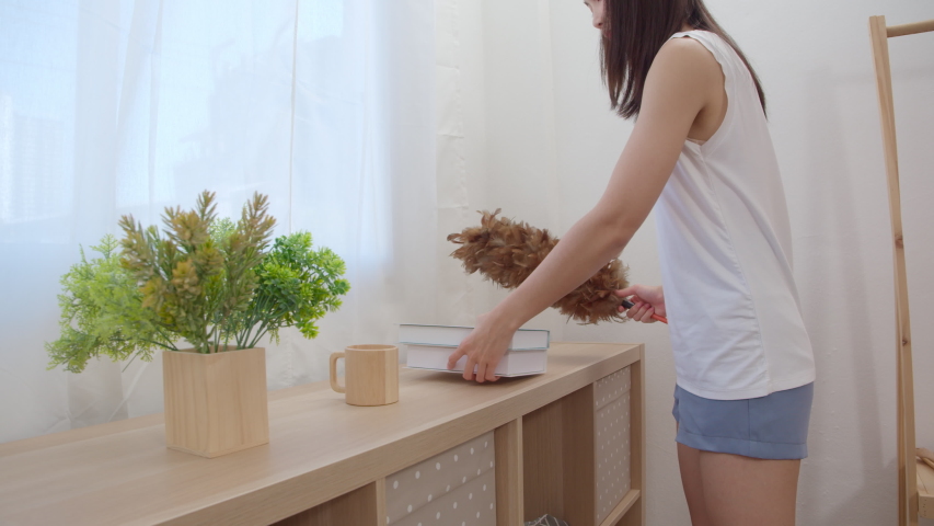 Asian Woman Cleaning Her Living Stock Footage Video (100% Royalty-free) 1031957366 | Shutterstock
