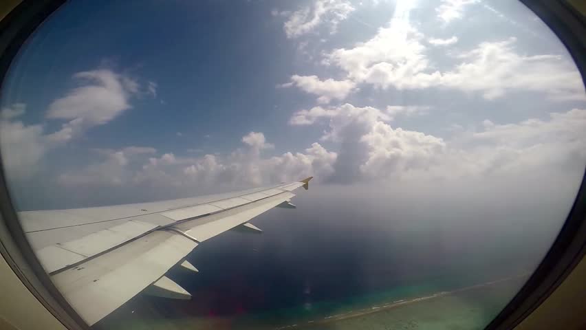 Beauty Sky. Plane Above The Ocean And Under The Clouds. Window View ...