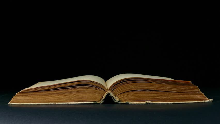 Book Page Turning On Black Background 4k Footage Arkivvideoopptak ...