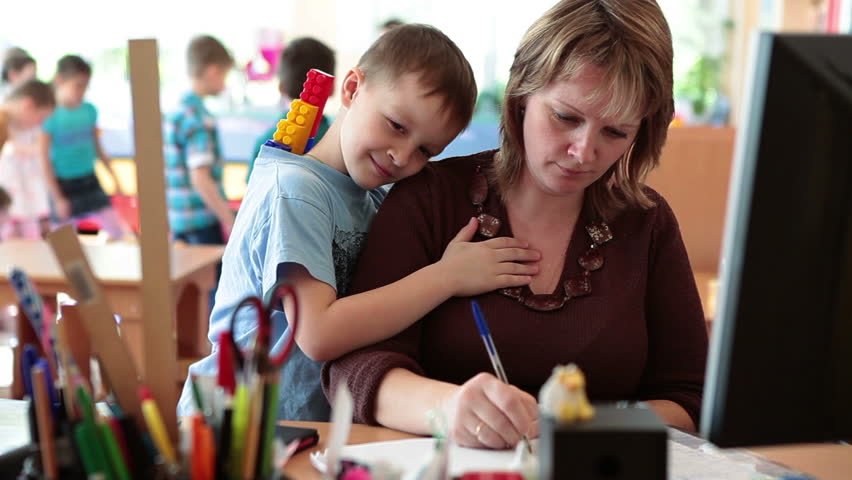 Daycare Educator with Son at Stock Footage Video (100% Royalty-free ...