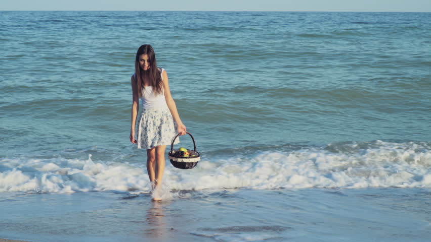 Young Woman Walking Into The Water Stock Footage Video 757909 ...