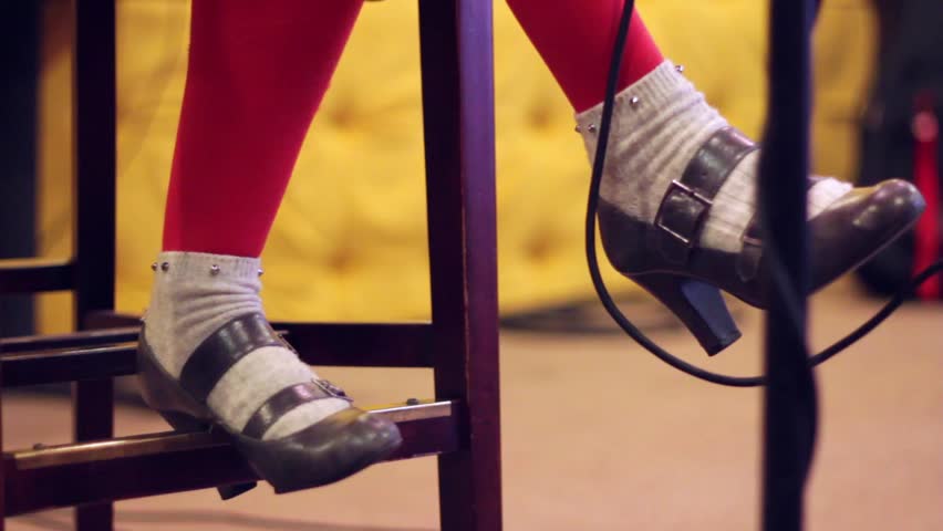 Girl Tapping Foot While Playing Stock Footage Video (100% Royalty-free ...