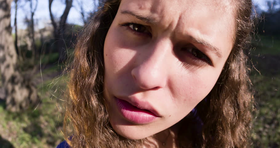 Young Woman Turns Towards The Camera, Then Gapes And Gasps In Disgust ...