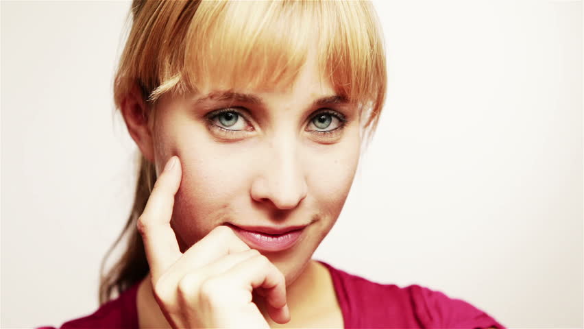 Stock video of happy young woman thinking and smiling | 1280116 ...