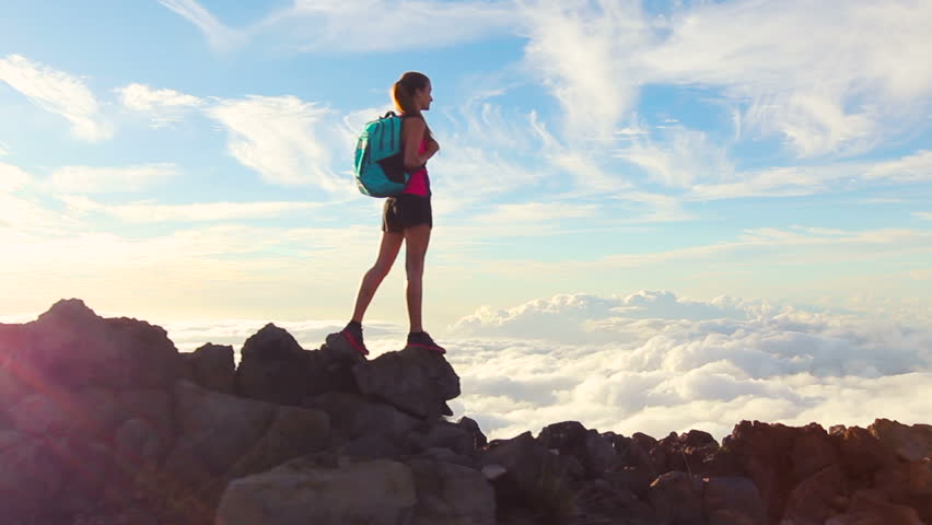 SLOW MOTION, CLOSE UP: Courageous Female Hiker Climbing Mountaintop ...