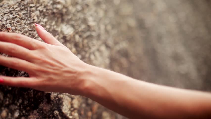 Stock video of girl is walking along wall and | 13025006 | Shutterstock