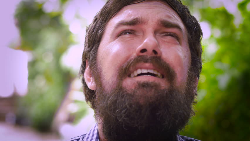 Close Up Portrait Of A Young Hipster Man With A Full Beard Letting Out ...