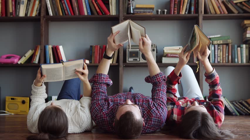 Group of Students Reading Book Stock Footage Video (100% Royalty-free ...