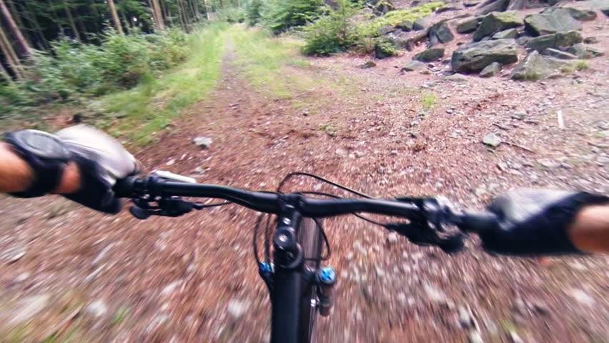 Speed Riding Downhill A MTB Bike On Rocky Mountain. View From First ...