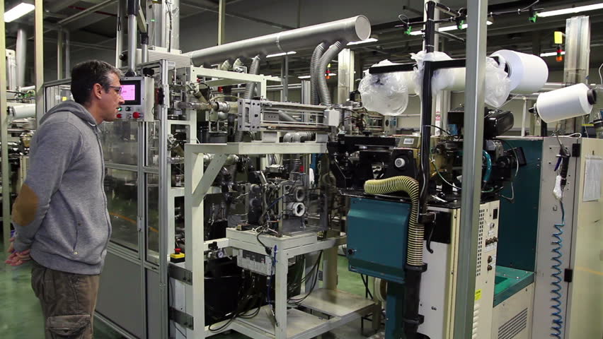 Clip vidéo libre de droits de A Clothing Engineer Oversees Garment ...