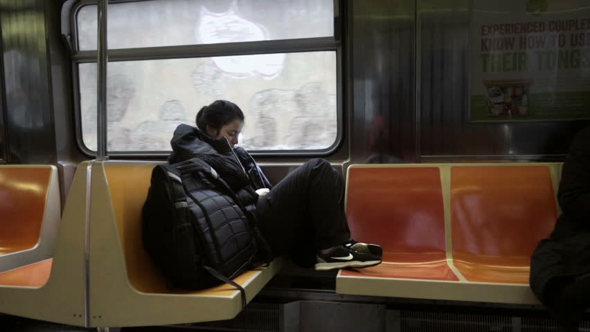 NEW YORK - MAY 6, 2016: Passengers Sleeping On Subway Train Passing ...