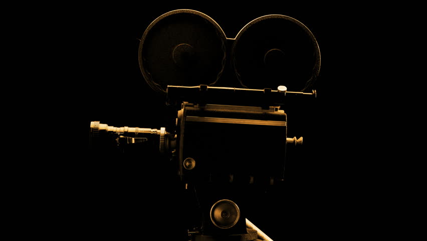 Vintage Hollywood Movie Camera In Front Of Black Backdrop. Suitable For ...