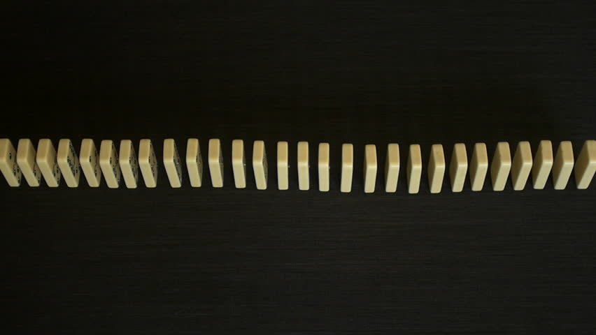 Close Up Side View Of The Domino Effect In Real Time Filmati e video d ...