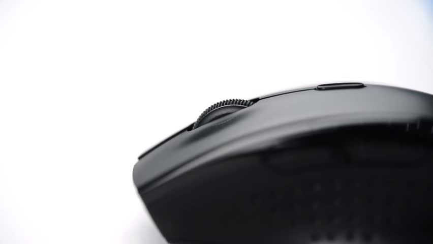 Hand Holding And Moving A Computer Mouse Against A White Background ...