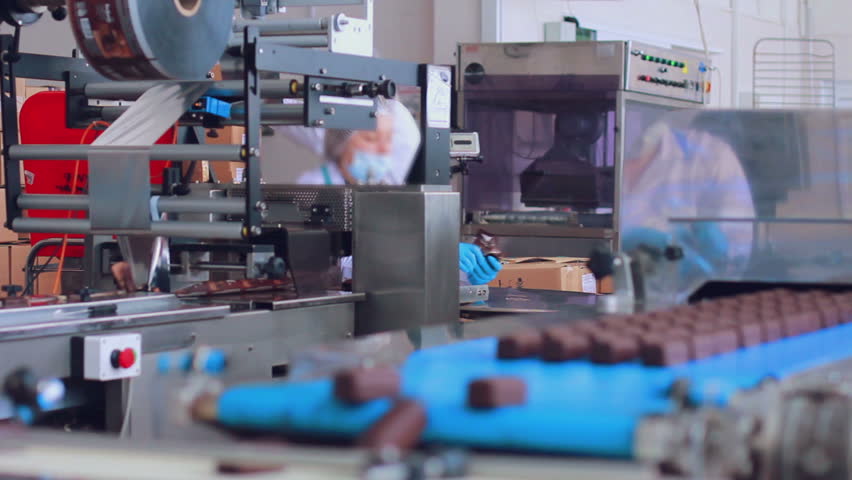 Production Line For The Production Of Chocolates. Candy Covered With ...