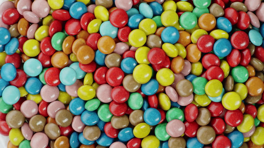 Colorful Coated Chocolate Candies Rotating Stok Video (%100 Telifsiz ...