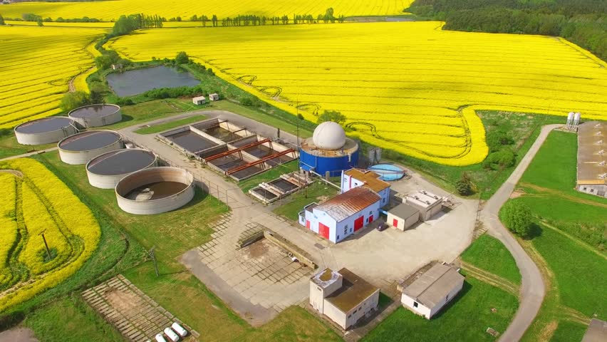 Camera Flight Over Biogas Plant From Pig Farm In Green Fields ...
