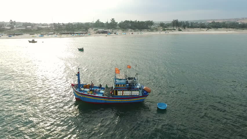 An Old Fishing Boat Near The Shore. Asian Region. South China Sea ...