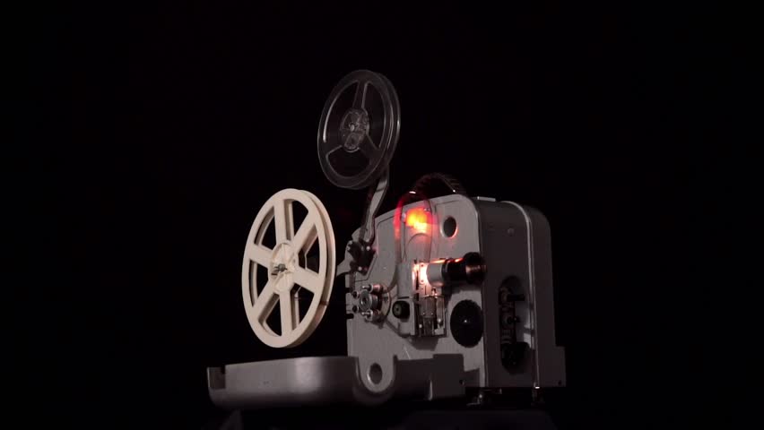 Retro Movie Projector On A Black Background. The Film 8 Millimeters ...