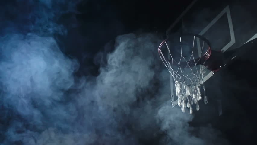 Sportsman Jumping Up In The Dark Court And Trying To Score At ...