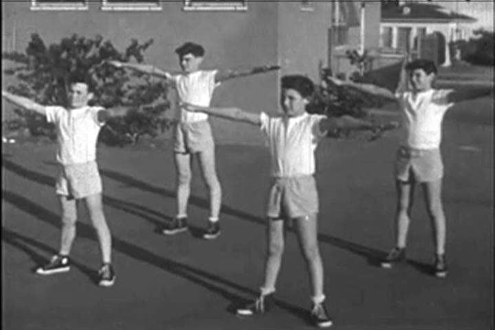 Boys Demonstrate A Rhythmic Exercise In Regular And Slow Motion ...