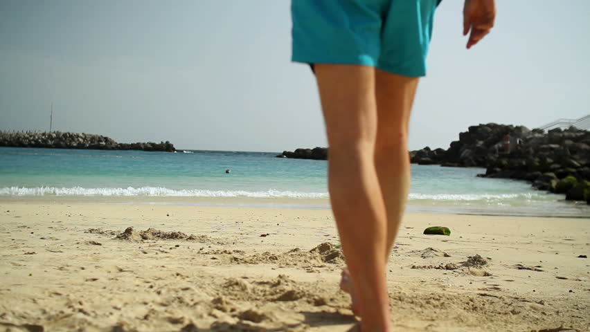 Man in Blue Trunks Walking Stock Footage Video (100% Royalty-free ...