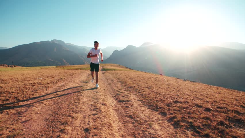Runner - Athlete Man Running Training Outdoors Exercising On Mountain ...