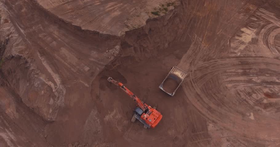Top View Of Mining Equipment Working At Sand Mine. Crawler Excavator ...