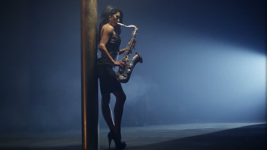 Stock Video Clip of Young, beautiful, sexy, brunette woman dancing and ...