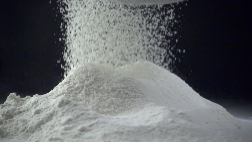 Pile Of Sugar On Black Background Shooting With High Speed Camera ...