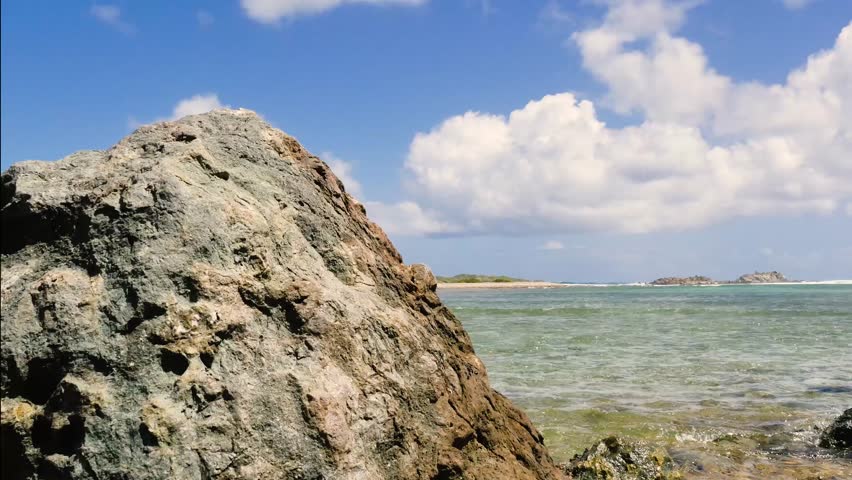Pan-rocks in Foreground to Beautiful Stock Footage Video (100% Royalty ...