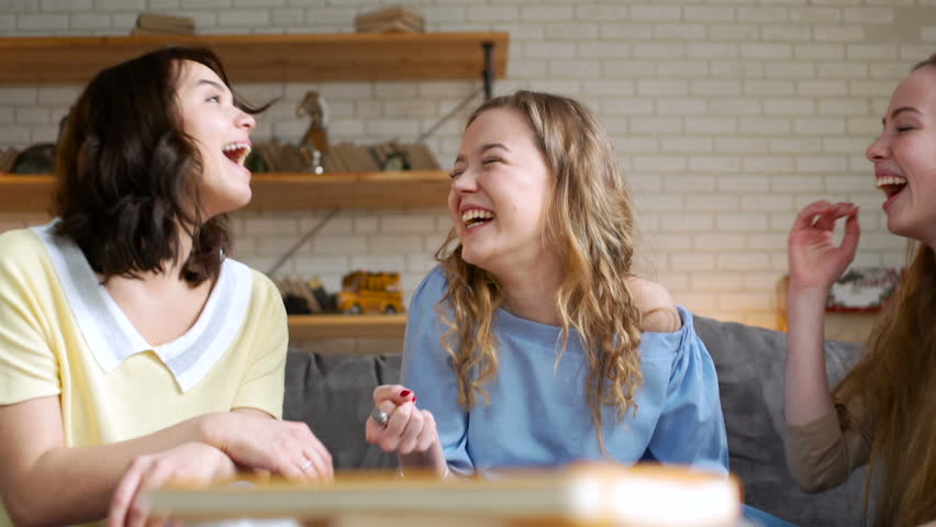 Three Young And Energetic Best Friend Girls Talk Together Emotionally ...