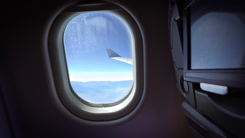 Person Look Through Airplane Window. Inside Airplane Darkness While ...