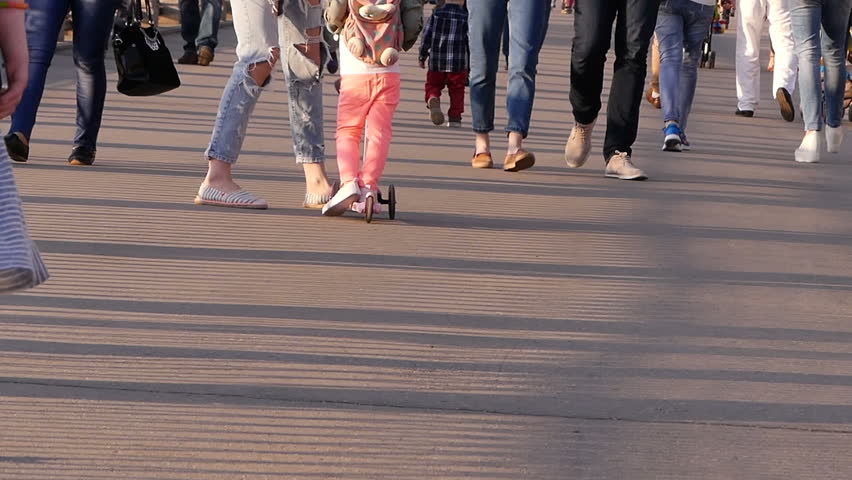People In Motion. Legs Of People In Casual Shoes. Street Life With Men ...
