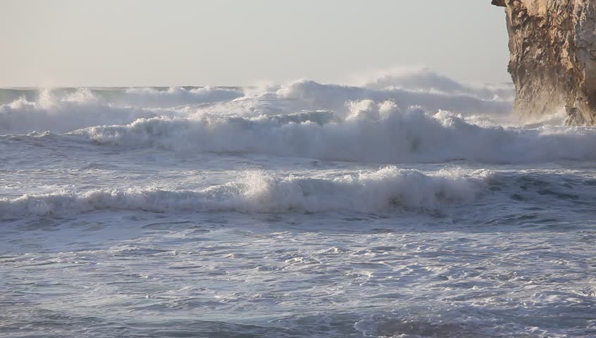 Storm Waves Breaking Against Rocks On Ocean Shoreline, Storm Surge ...