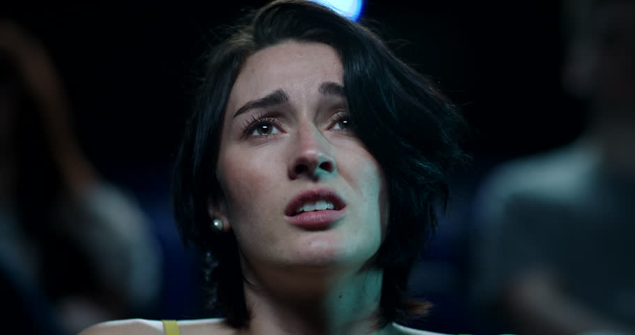 A Young Woman Beings To Get Upset While Watching A Sad Movie At The ...