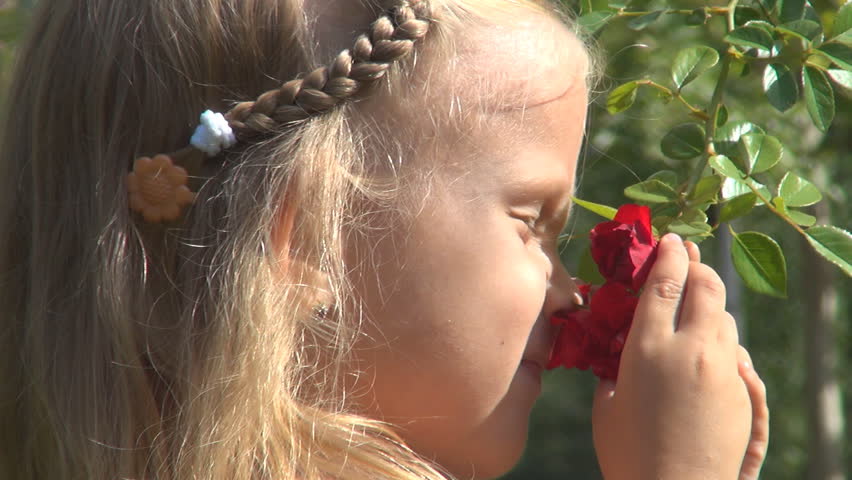Child Smelling and Playing with Stock Footage Video (100% Royalty-free ...