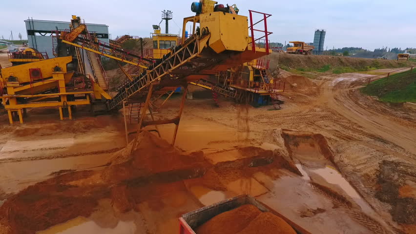 Top View Of Mining Equipment Working At Sand Mine. Crawler Excavator ...