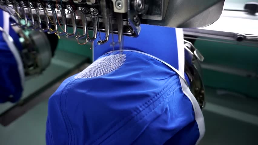 Stock video of computerized machine embroidery , industrial sewing ...