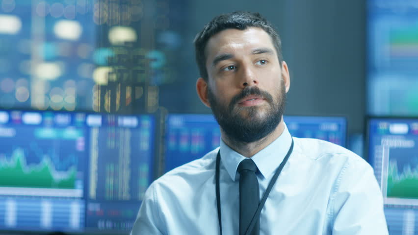 Handsome Stock Market Trader Thinks Stock Footage Video (100% Royalty ...