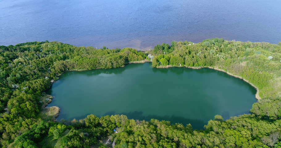Lake Surrounded By Forest from Stock Footage Video (100% Royalty-free ...