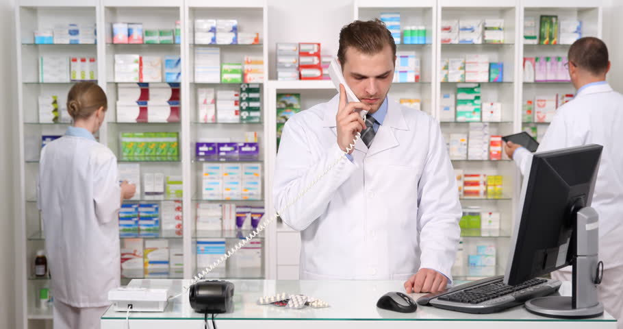 Pharmacists Team Work Busy Pharmacy Store Inventory Man Talk Phone ...