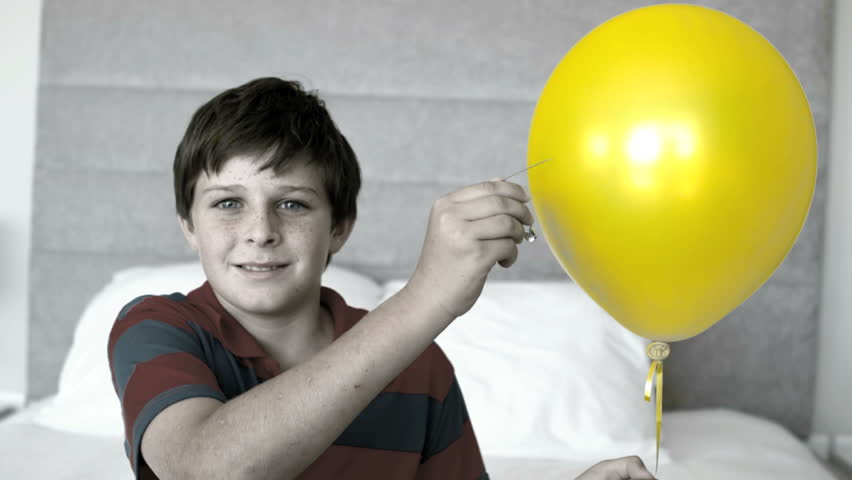 Boy Piercing His Yellow Balloon And Getting A Fright In Slow Motion At ...