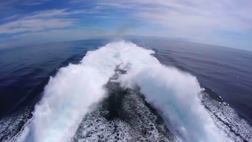 Power Boat Cutting Through The Waves - Slow Motion. Slow Motion Shot Of ...