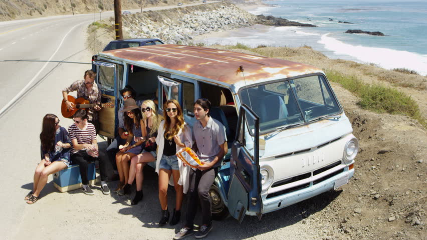 Stock Video Clip of Group of young people on road trip | Shutterstock