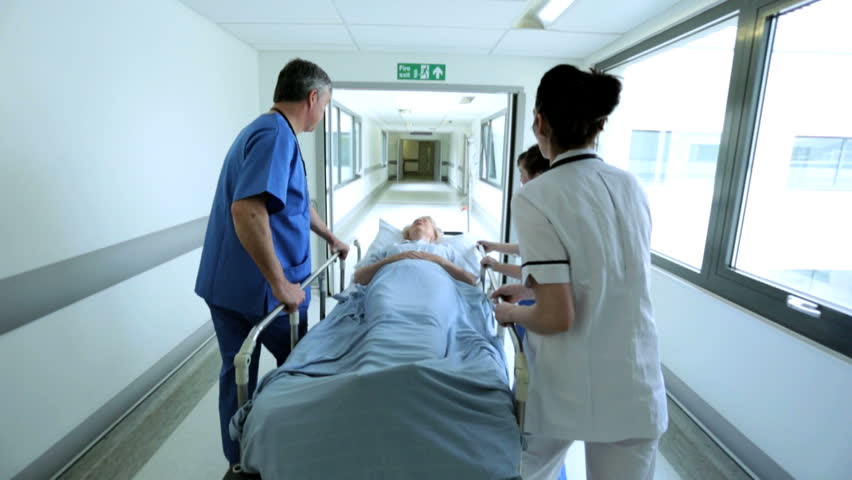 Stock video of elderly caucasian female patient being moved | 4807376 ...