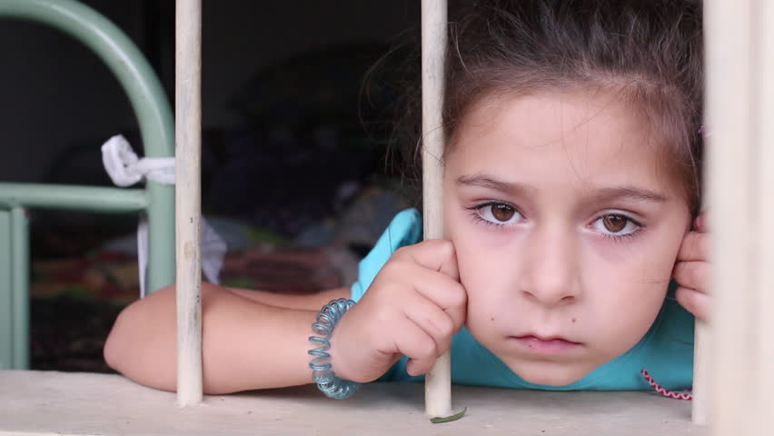 Cute Little Girl Behind Bars. Desperate Little Girl. Stock Footage ...